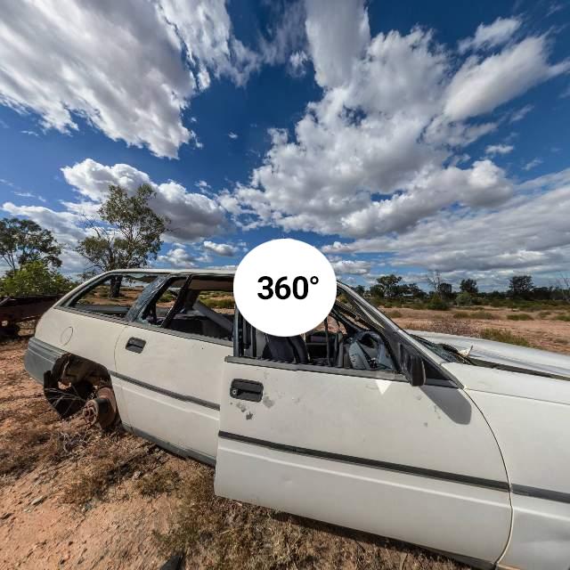 A busted Holden Commodore at the dirt bike track. Sapphire, Qu...