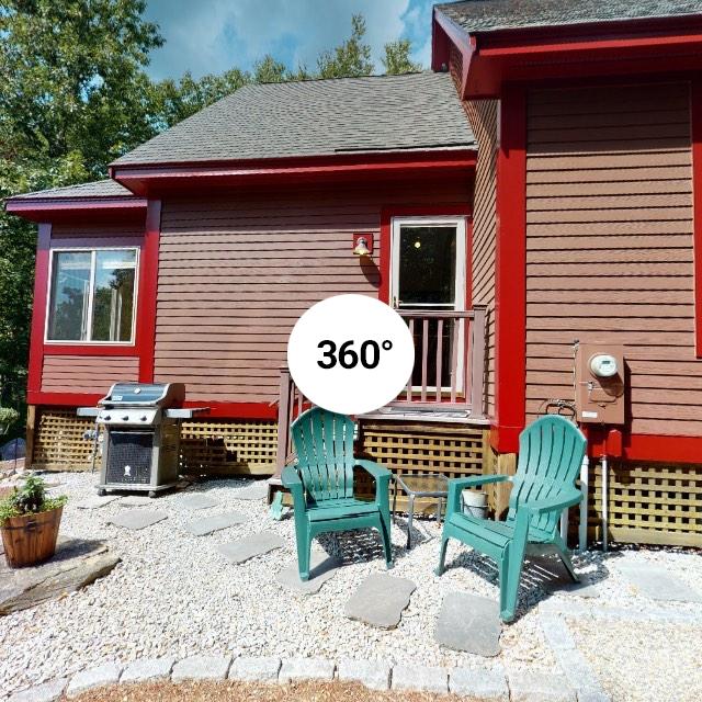 Side yard overlooking trail.