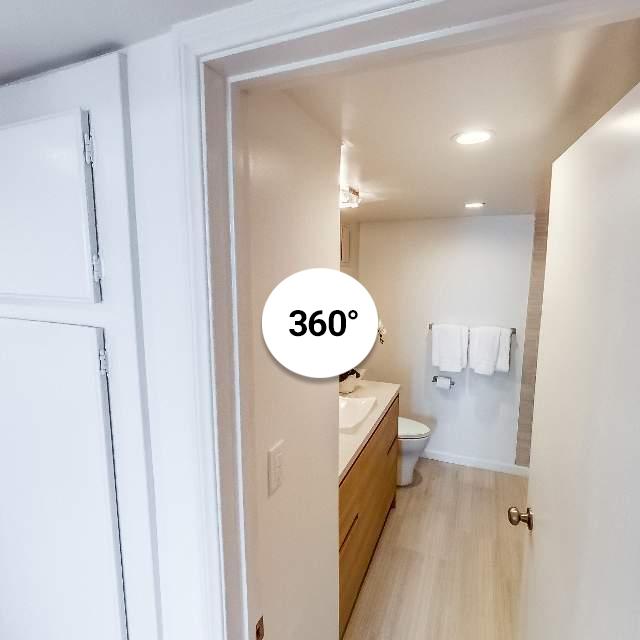 Hallway Sophisticated updated luxury high-rise condo in a ful...