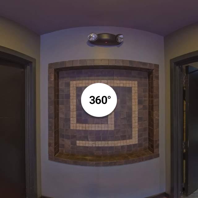 By restrooms 1st floor